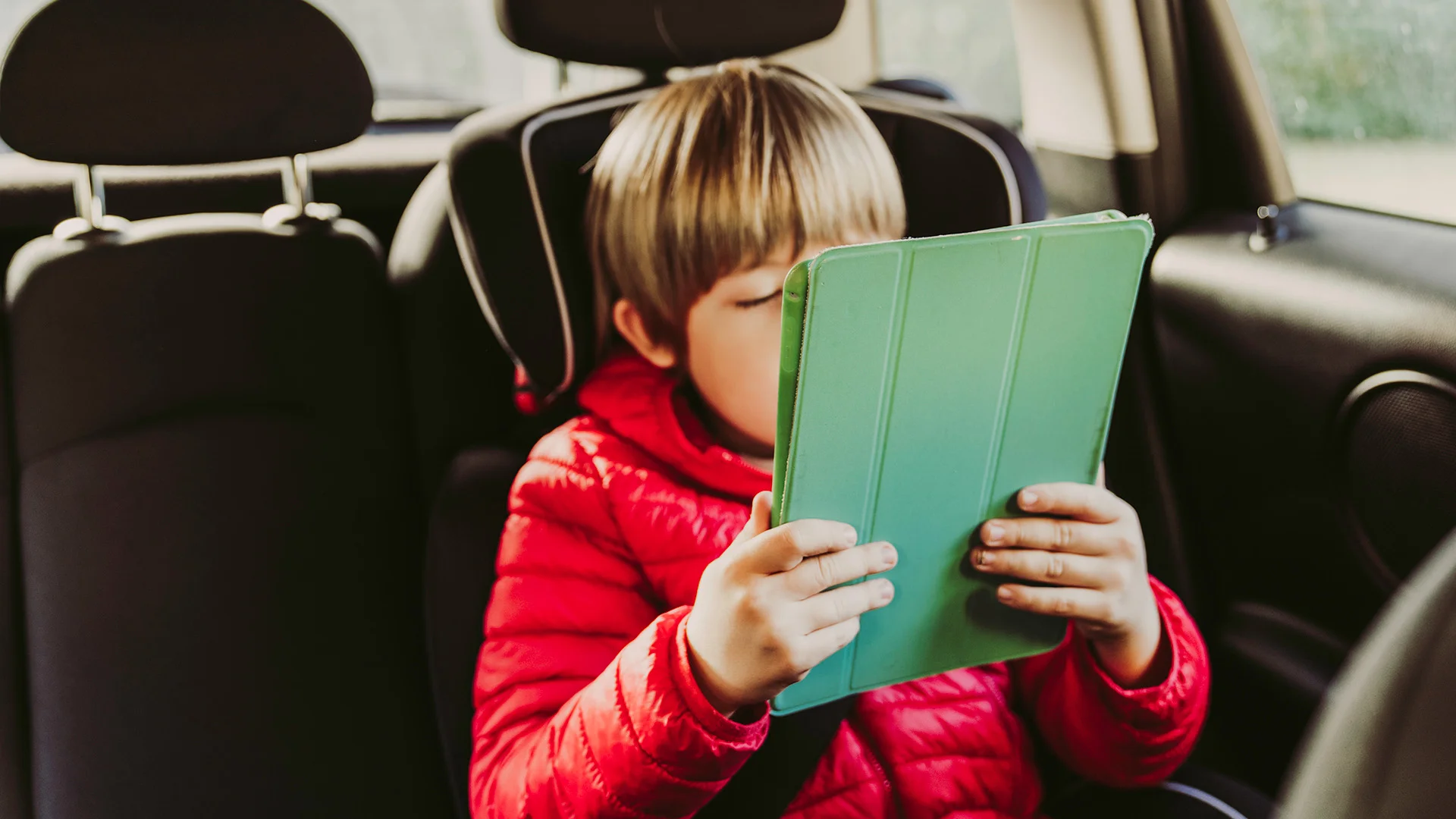 Using Screens to Distract Kids Makes Their Behavior Worse Long Term ...