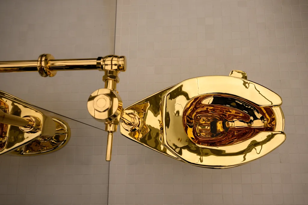 Sotheby's Tried to Auction a $10 Million Golden Toilet—It Got Awkward Fast